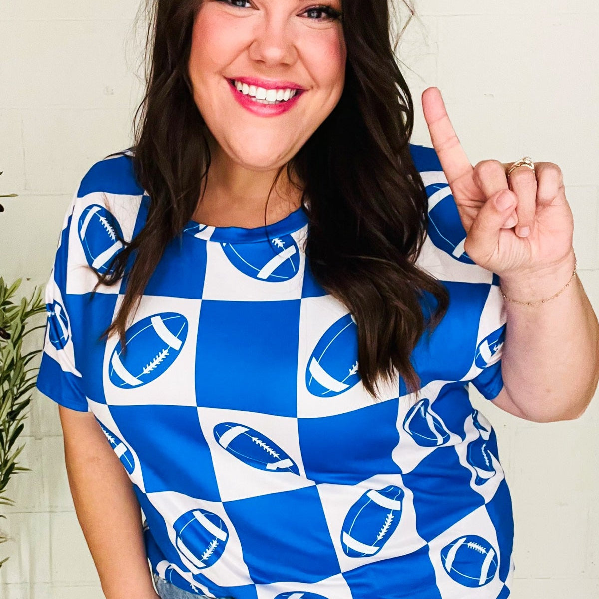 Turn Up The Volume Blue Football Checker Print Top – Charming Charlie