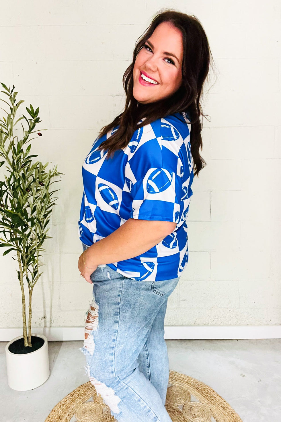 Turn Up The Volume Blue Football Checker Print Top – Charming Charlie