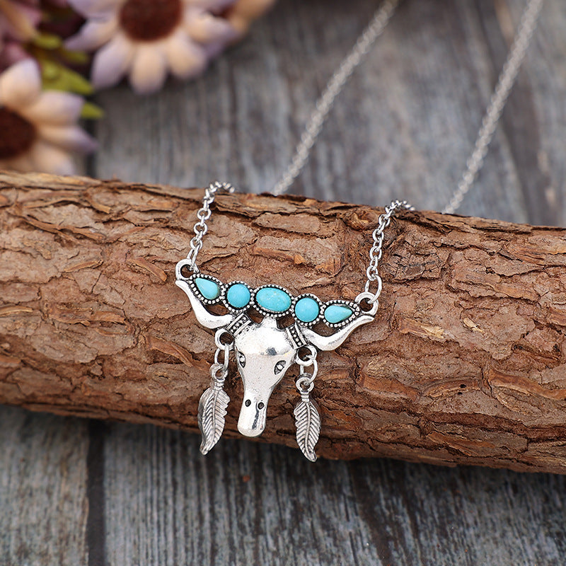 Artificial Turquoise Cow Shape Necklace – Charming Charlie